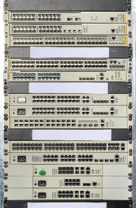 Network Switches And Routers Stacked In A Data Center View Showcasing