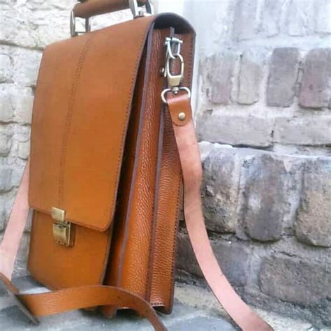 خرید و قیمت کیف اداری و دانشجویی و مردانه زنانه دختر پسرانه چرم طبیعی دست دوز دو شده با رنگ