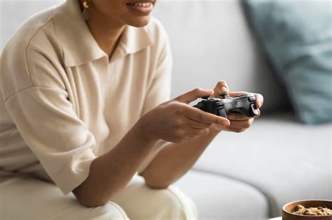 Premium Photo Close Up Woman Holding Controller