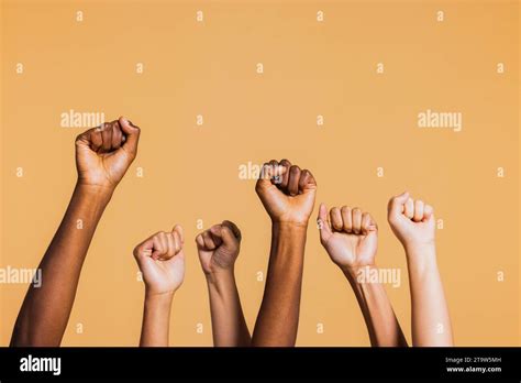 Hands Raised With Closed Fists Diverse Coloured Hands Raised Up With
