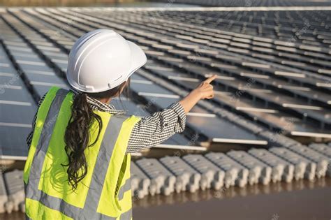 Premium Photo Asian Engineer Working At Floating Solar Farmrenewable