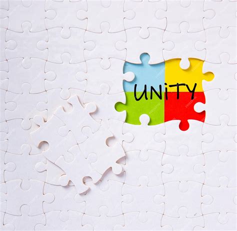 Premium Photo Puzzle Pieces Connected To Each Other With The Word Unity