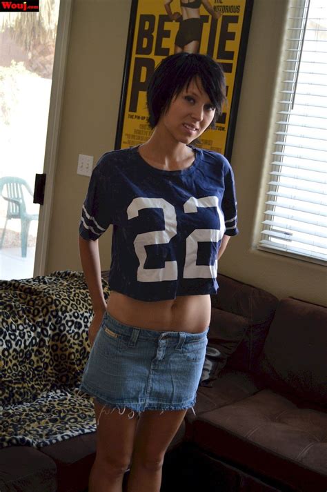 Lovely Chick Posing In A Jersey And A Denim Skirt 15 Photos
