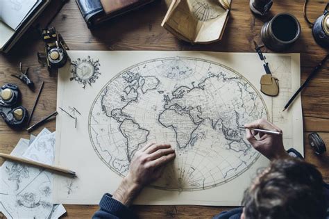 Artist Cartographer Drawing A Detailed Map With Specialized Tools On A