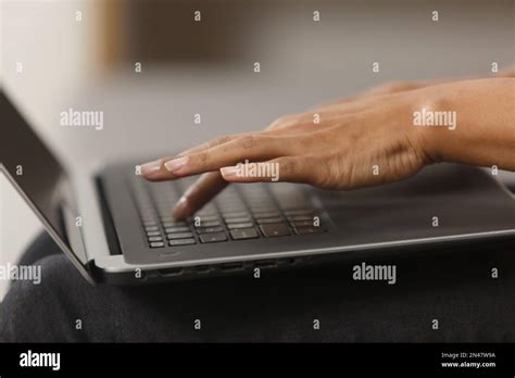 Black Female Hands Typing Text On Laptop Keyboard Unrecognizable Bipoc