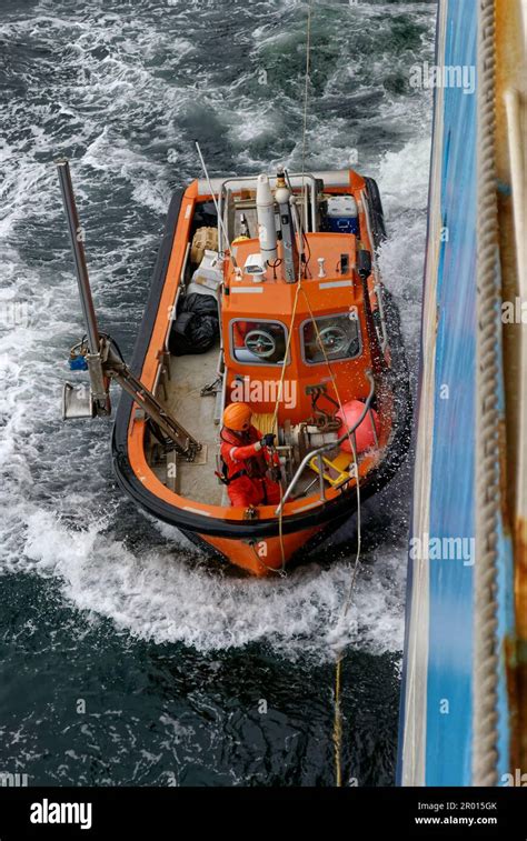 A Small Norpower Seismic Workboat Being Recovered To The Seismic Mother