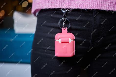 Premium Photo An Aesthetic Pink And White Tws Closeup Earbuds In Case