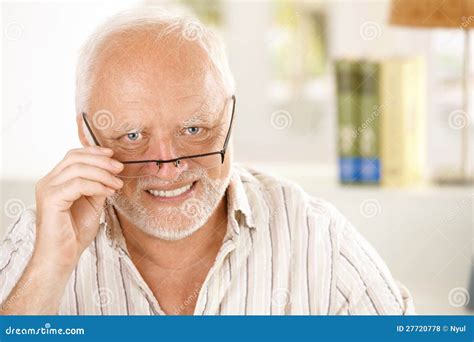 Man Wearing Glasses After Taking Vision Test At Doctor Stock