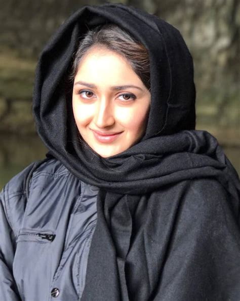 Actress Sayesha Saigal Navel Stills In Blue Dress Glamorous Indian Models