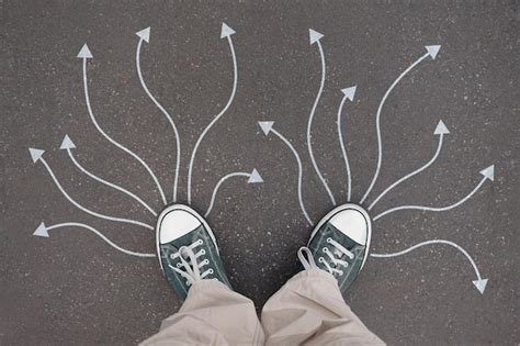 Premium Photo Multiple Arrows Choice Concept Legs With Trainer Shoes