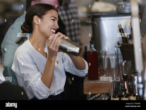 Us Representative Alexandria Ocasio Cortez Bartends And Waits On