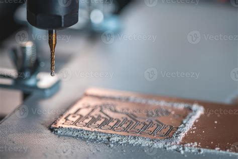 Machine With Numerical Control CNC Carries Out Milling Of Printed Circuit Boards Circuit