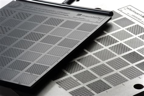 It Takes Two Structuring Metal Surfaces Efficiently With Lasers