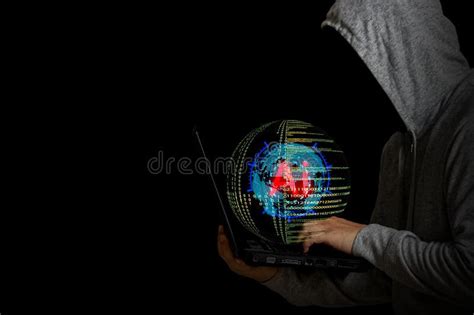 Hooded Hacker Using Laptop With Virtual Globe And Binary Code Hacker