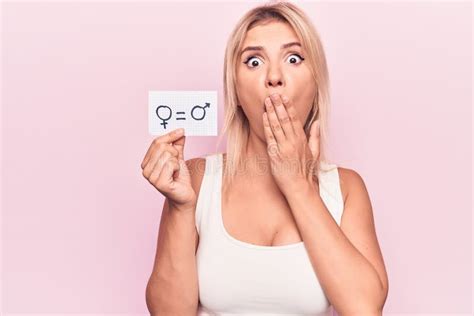 Young Blonde Woman Asking For Sex Discrimination Holding Paper With