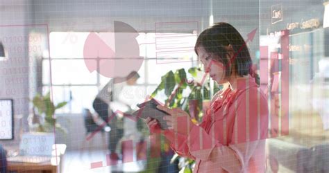 Image Of Graphs Globe Loading Circles Over Asian Woman Scrolling On Digital Tablet In Office