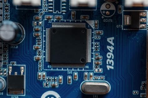 Premium Photo Chip On A Blue Motherboard Computer Hardware And Processor