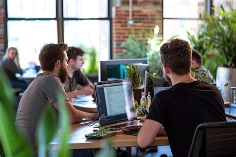 Premium Photo Technology Startup Team Coding And Collaborating