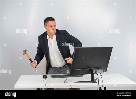 Man Destroying Computer High Resolution Stock Photography And Images Alamy