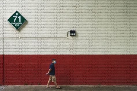 A Man Walking Pass Block 71 Commonwealth Drive Singapore Editorial Photography Image Of