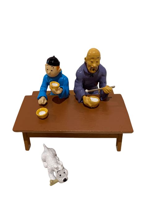 Collection Tintin Figurine And Albums Carré Darts