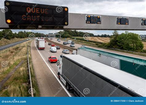 Overhead Motorway Speed Reduction Sign Warning Traffic About A Queue Ahead Editorial Image