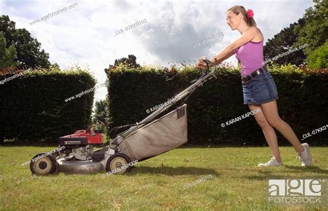 Women With Push Lawnmower Stock Photo Picture And Royalty Free Image Pic Cul Kk