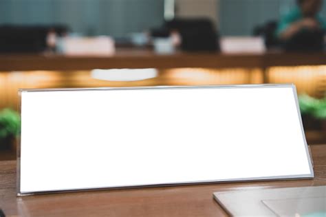 화이트 모형 아크릴 프레임 포스터 패턴 템플릿 은 고객의 텍스트에 대한 회의 테이블 배경 삽입에 이름을 표시 사용할 준비가 편지 시트에 대한 배경을 형성한다 문자 메시지