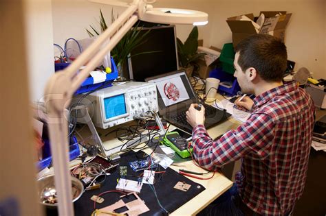 Electrical Engineer Testing Component At Work Bench Stock Image Colourbox