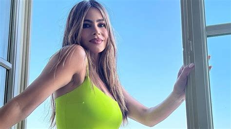 Sofia Vergara Glows In A Neon Green Swimsuit On Italian Holiday