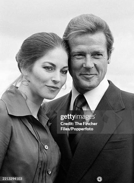 British Actors Barbara Kellerman And Roger Moore Posing During A News Photo Getty Images