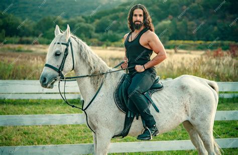 Premium Photo Man Horse Riding Muscular Torso Of A Male Rider On