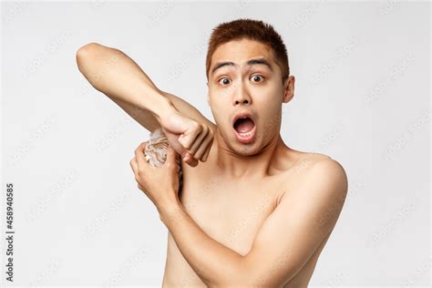 Beauty People And Hygiene Concept Portrait Of Startled And Scared Naked Handsome Asian Guy