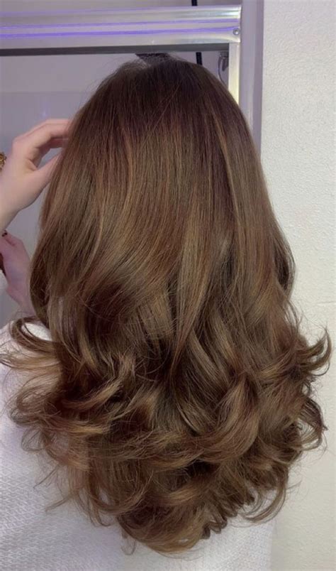 Exploring Chic Haircuts And Hair Trends Bouncy Layered Hair