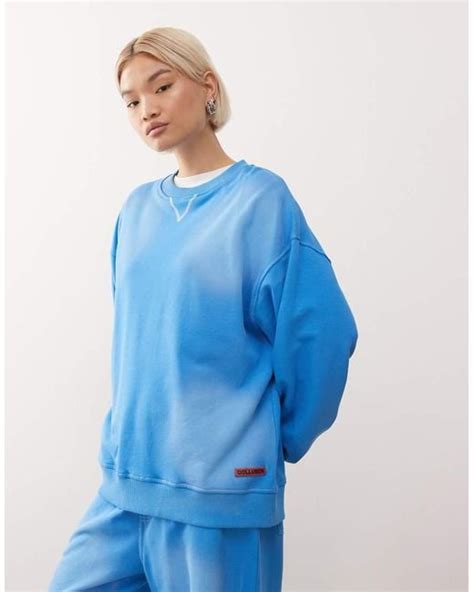 Collusion Washed Sweat With Red Logo Patch Co Ord In Blue Lyst Uk