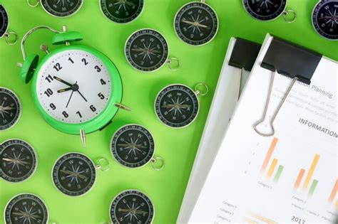 Premium Photo Directly Above Shot Of Navigational Compass With Alarm