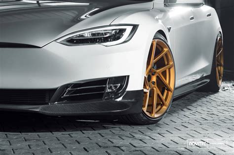 Novitec Puts Golden Vossen Wheels On Tesla Model S For That Impreza Sti
