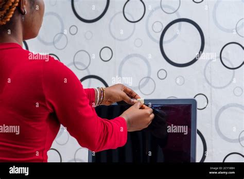 African Woman Seals Off Her Laptop Pc Webcam Stock Photo Alamy