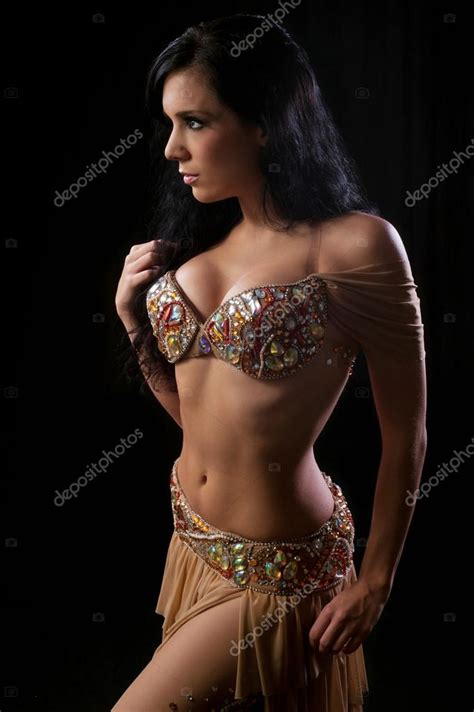 Brunette Belly Dancer Wearing A Beige Nude Colored Costume Stock Photo Katrinaelena