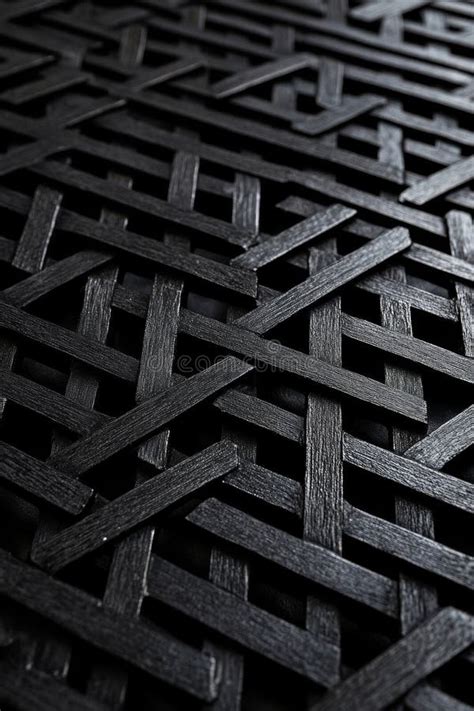 Intricate Black Wooden Lattice Pattern With Geometric Design For Modern Architectural Stock