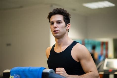 Premium Photo Man Running On The Treadmill In A Gym