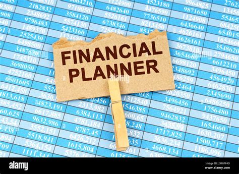 Business And Finance Concept There Is Cardboard On The Financial Tables With The Inscription