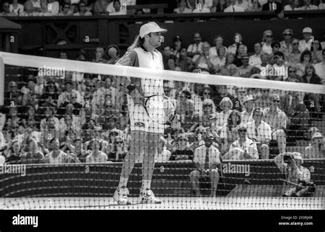 Andre Agassi Playing On Centre Court At Wimbledon Tennis Tournament In