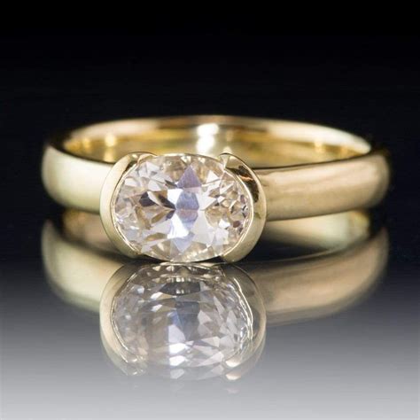 Genuine Oval White Sapphire Half Bezel Solitaire Hannah Engagement Rin