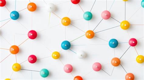 Colorful Abstract Molecular Structure With Interconnected Spheres And Lines On A White