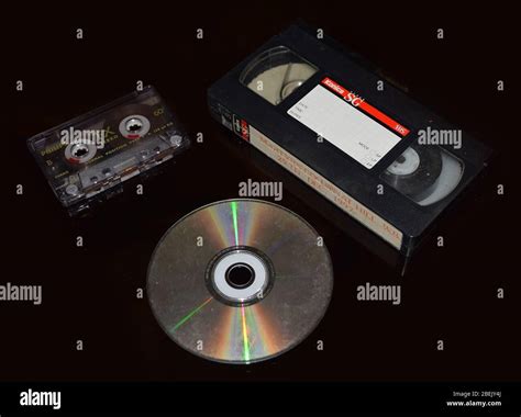 Audio Cassette Video Cassette Or Vhs Tape With Compact Disc Or Cd