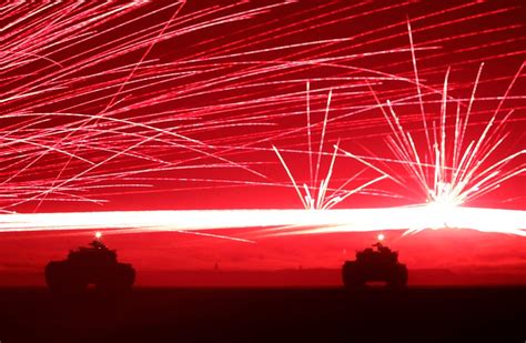 15 Fiery Photos Of Tracer Bullets Firing Business Insider