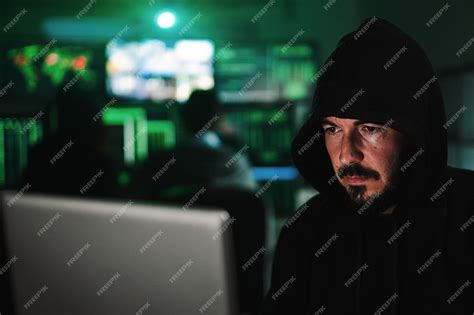 Premium Photo Close Up Portrait Of One Hacker Looking The Screen Of A