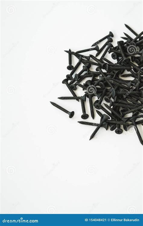 Black Screws Of Self Tapping Screws Of Same Sizes Isolated On White
