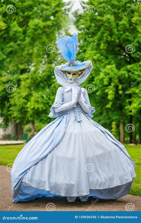 Masquerade Ball A Woman In A Beautiful Dress And Venetian Mask Stock